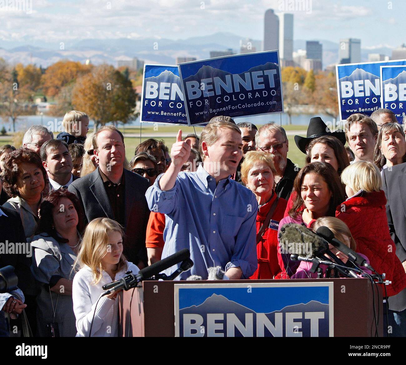 Sen. Michael Bennet, D-Colo., flanked by his wife Susan Daggett and ...