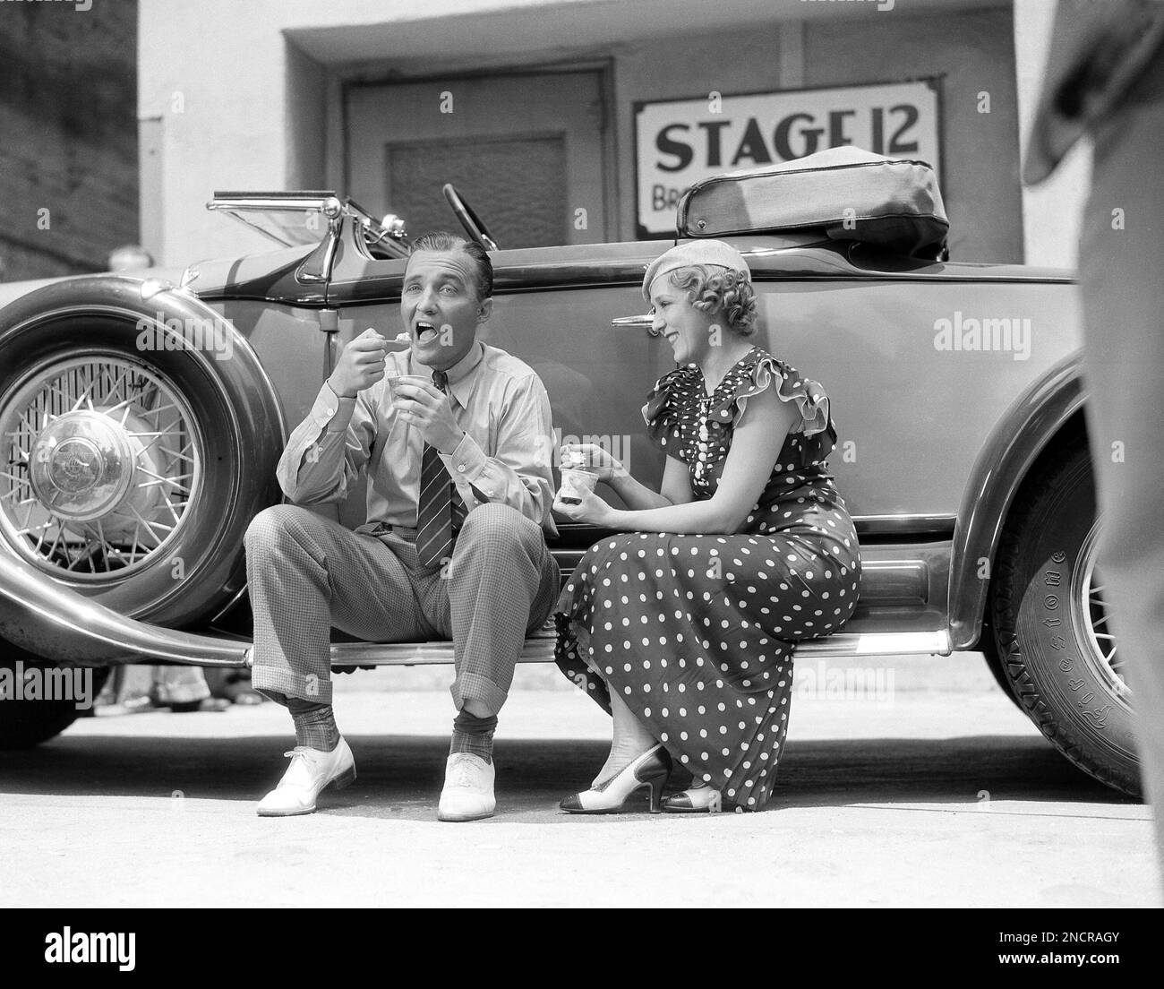 Bing Crosby and actress Mary Pickford are caught in an offstage moment ...