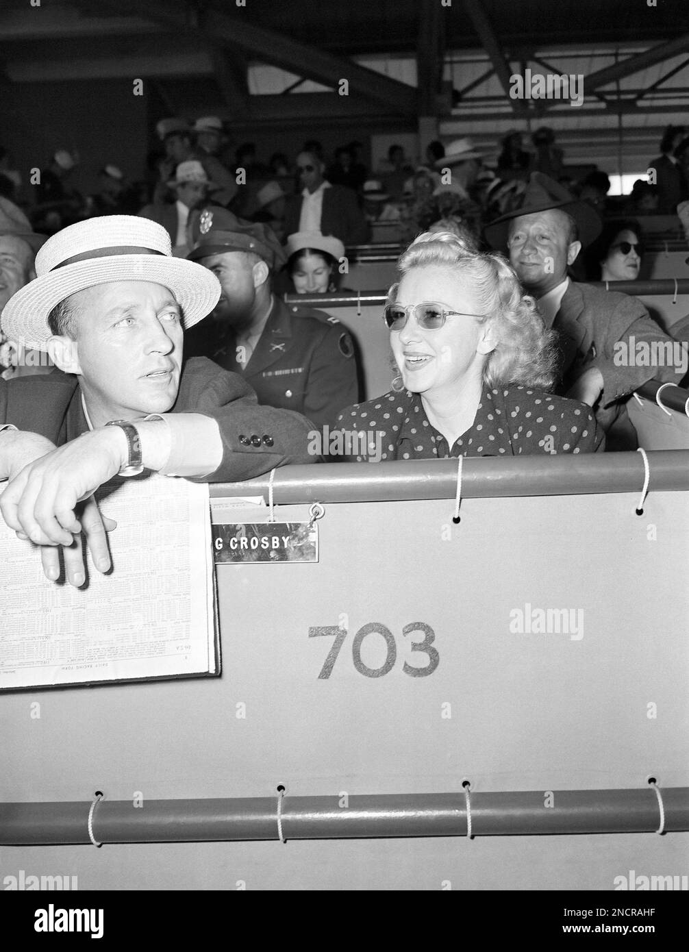 Crooner Bing Crosby and his wife, the former Dixie Lee, shown together at Santa Anita Park in ...
