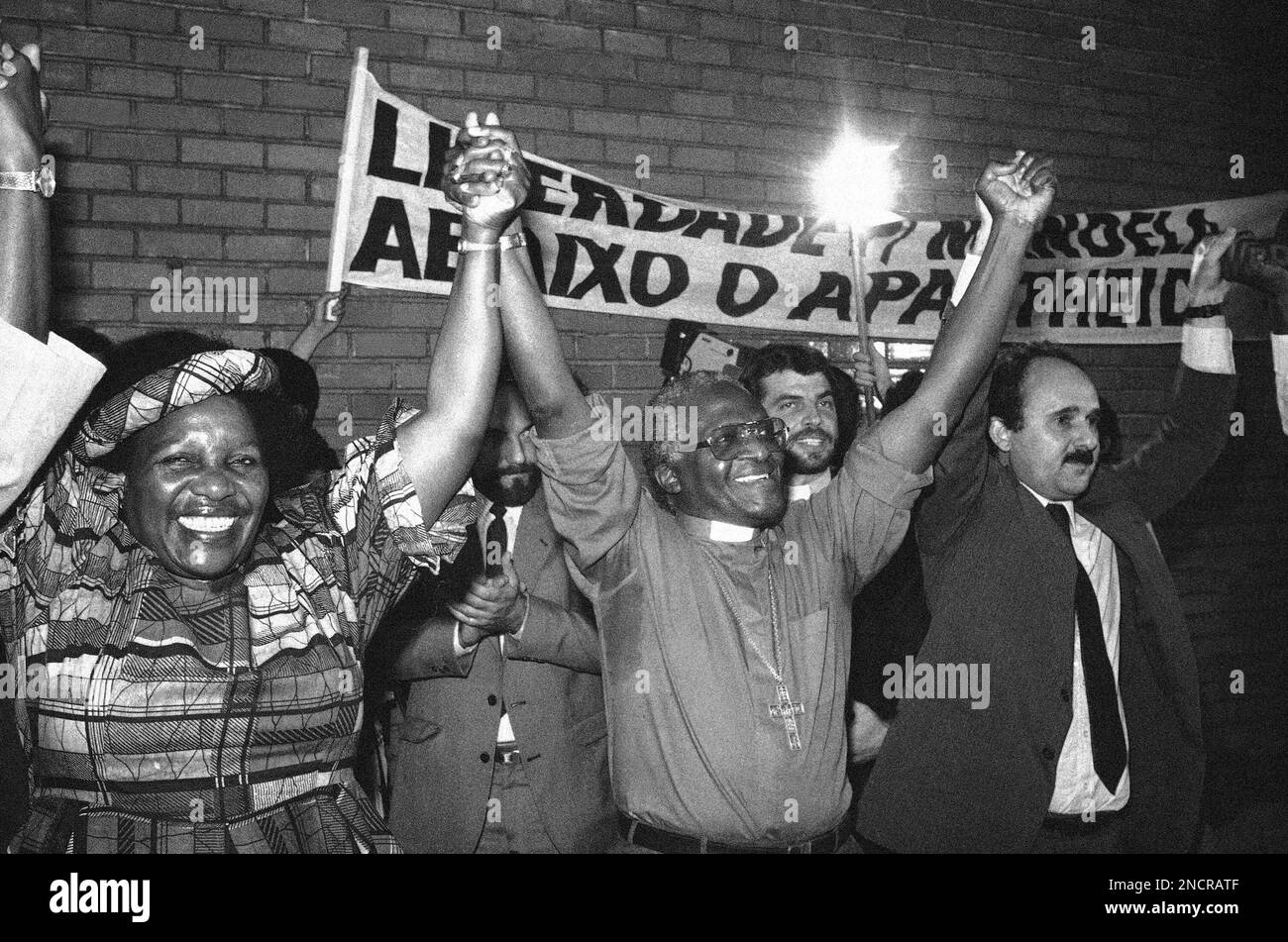 South African Bishop Desmond Tutu, center, urges students at the ...