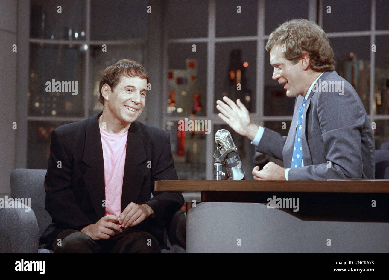 Performer Paul Simon listens to David Letterman on the set of NBC's ...