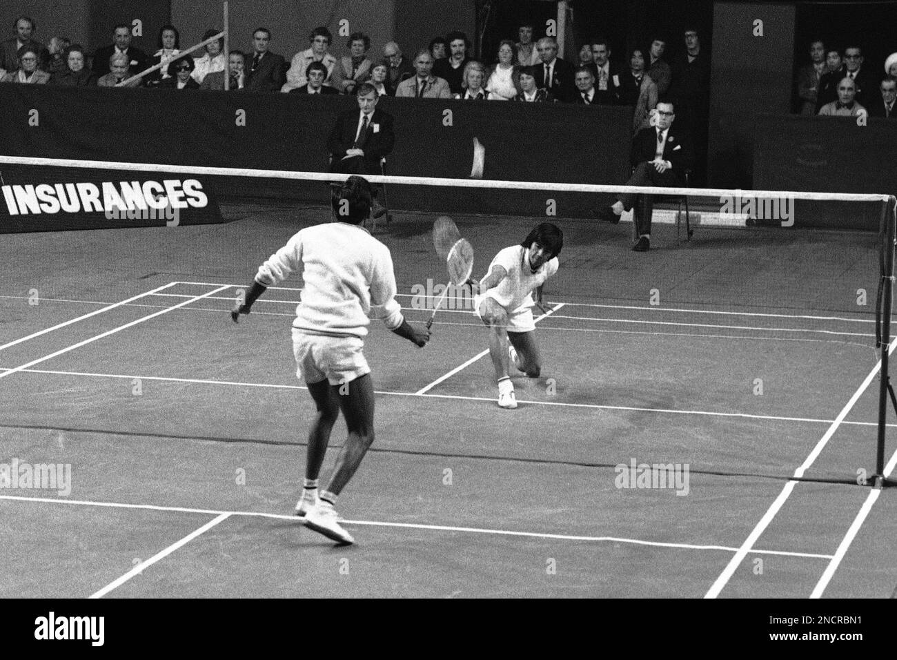 Rudy Hartono of Indonesia, right rear, makes a return to Punch Gunalan ...