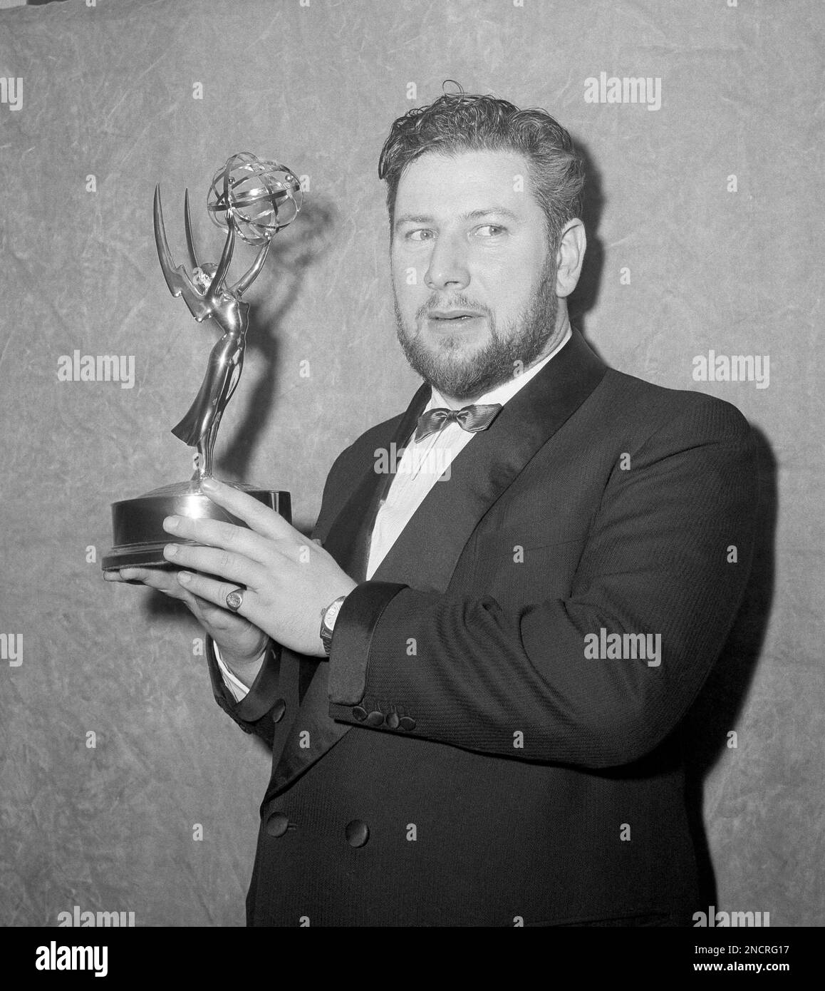 Peter Ustinov poses with Emmy Award he received at the presentations in ...