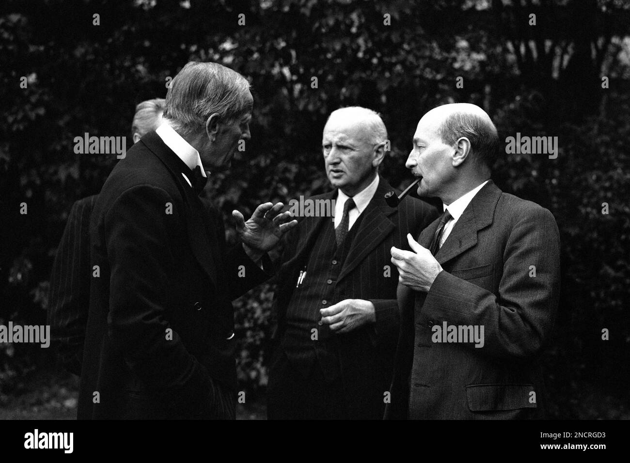 Britain's Prime Minister Clement Attlee, right,, and members of his ...