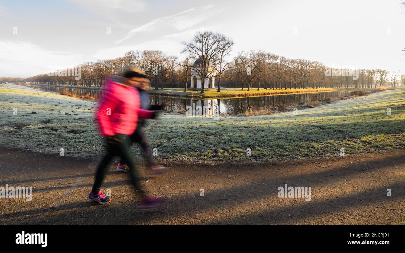 Hanover, Germany. 15th Feb, 2023. Two women walk past a corner pavilion ...