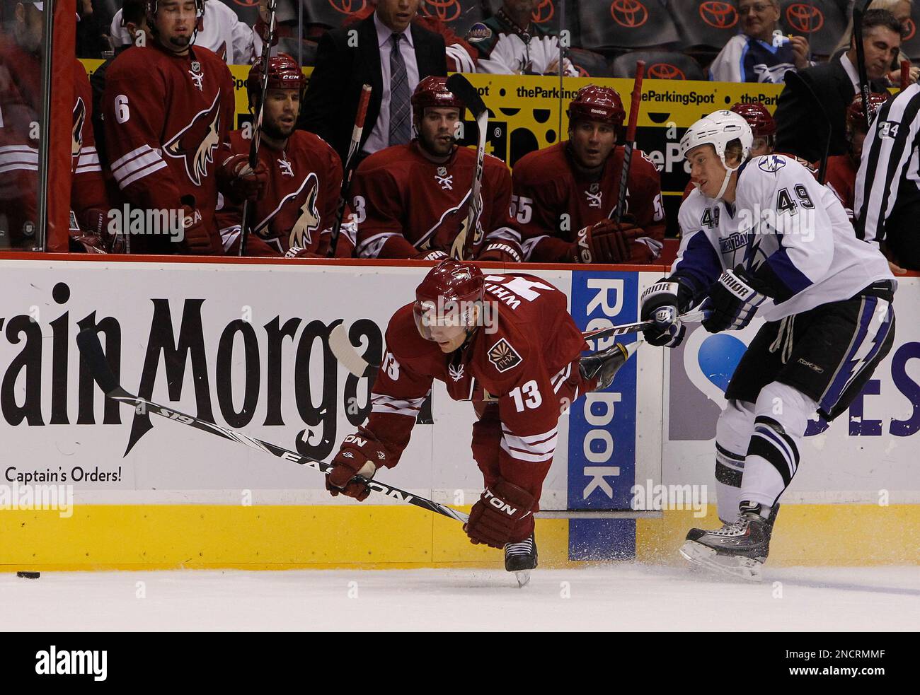 Phoenix Coyotes' Ray Whitney (13) gets tripped up by Tampa Bay ...