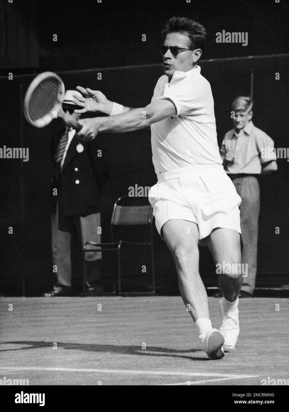 Professional sportsperson holding sport tennis racquet court playing hi ...