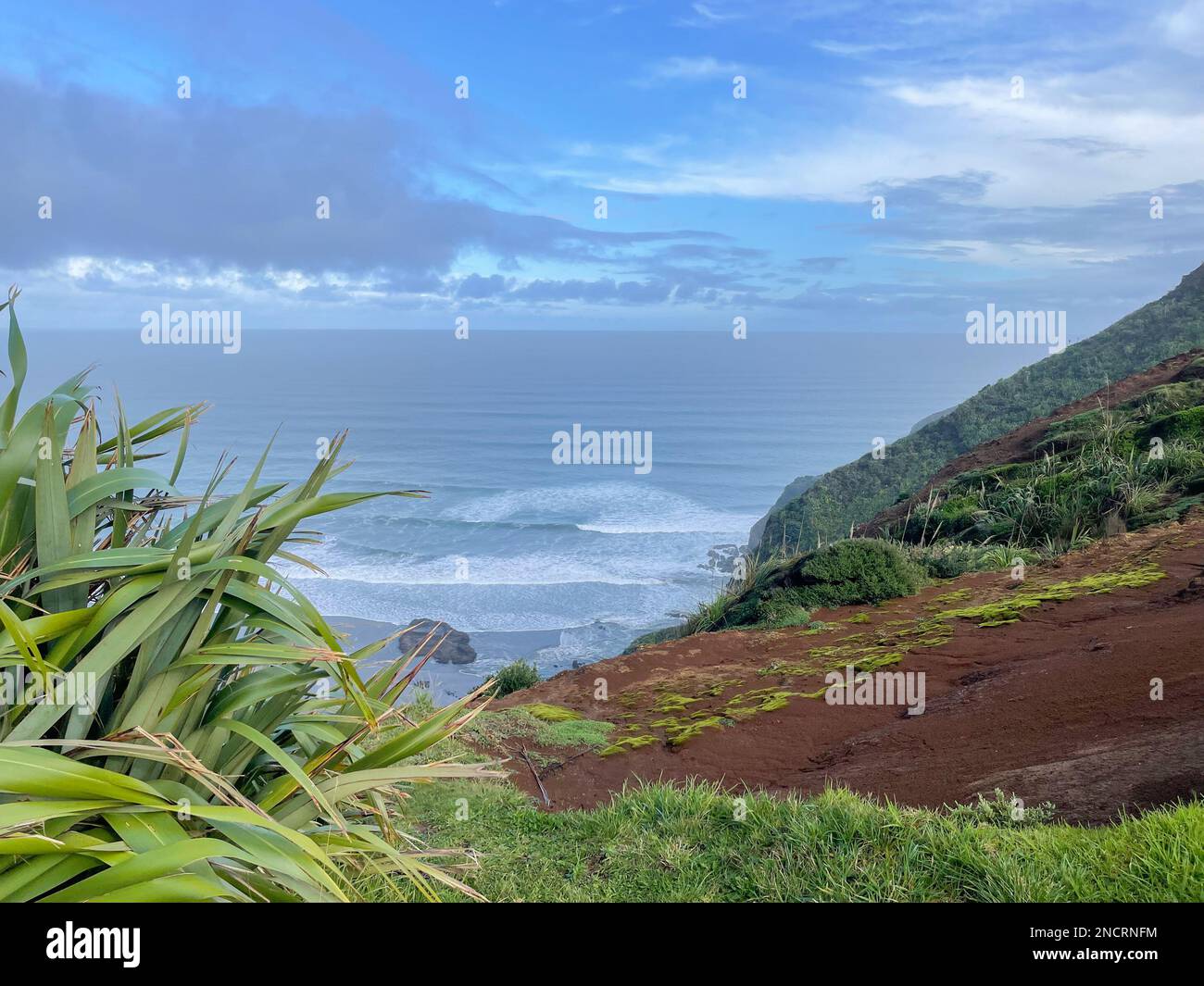 The view of picturesque landscape with a green slope and blue sea, O ...