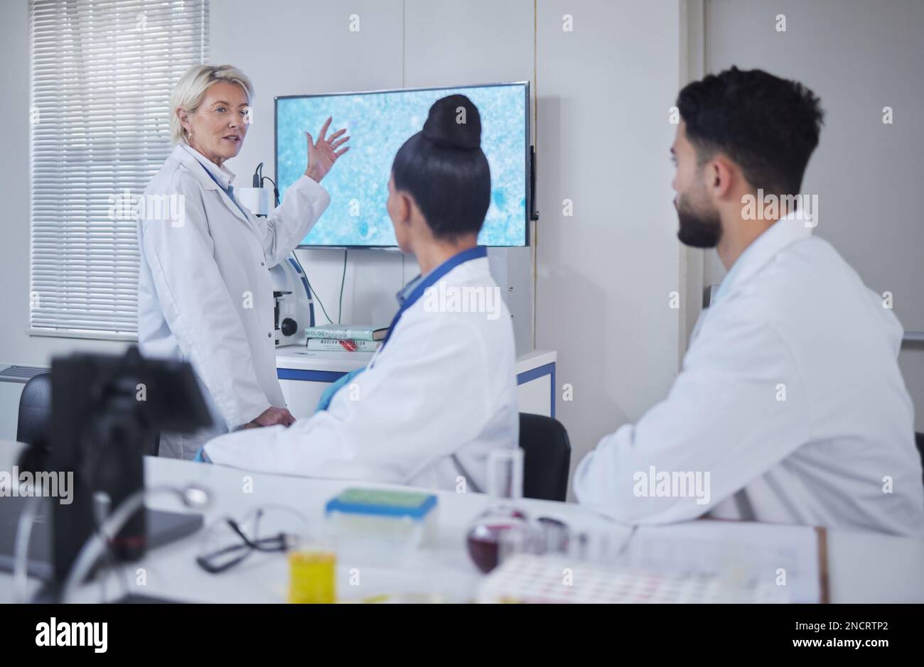 Science, presentation and woman scientist in the laboratory meeting ...