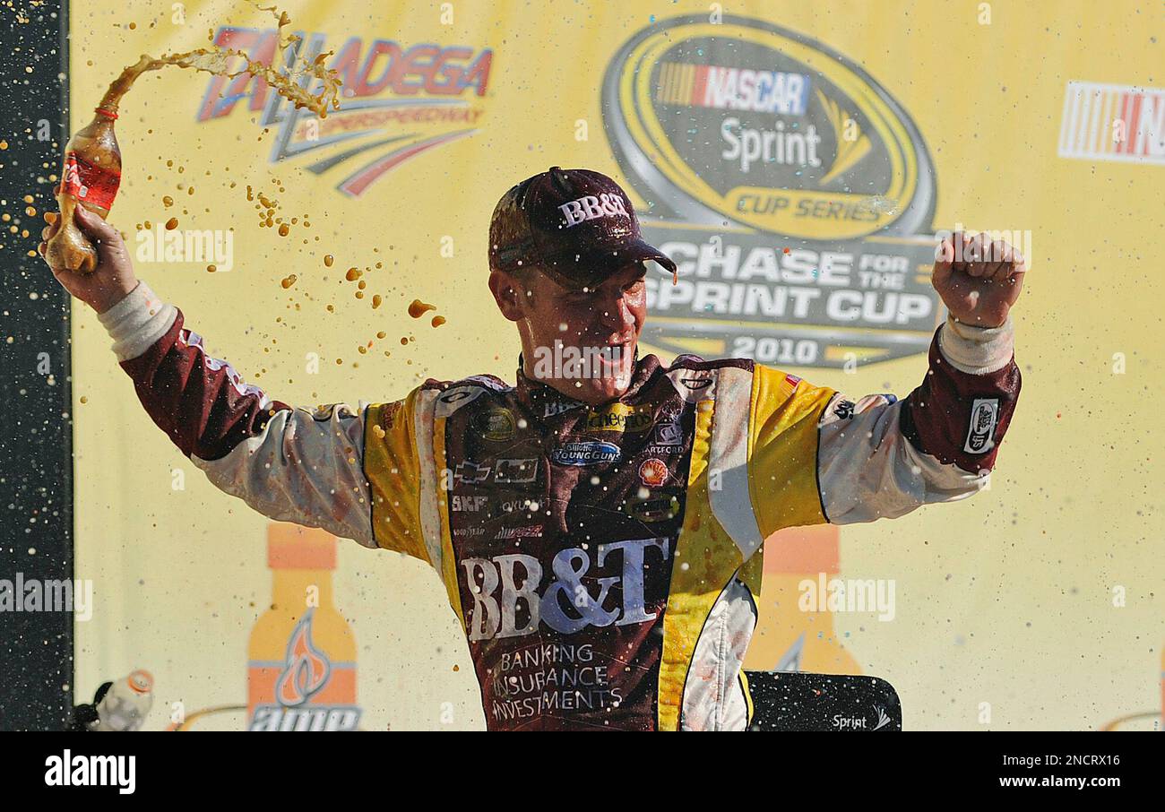 Clint Bowyer celebrates his victory in the NASCAR Sprint Cup Series ...