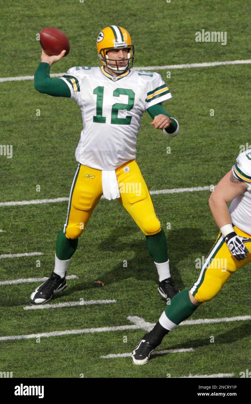 Green Bay Packers quarterback Aaron Rodgers (12) throws a pass during the first quarter of an ...
