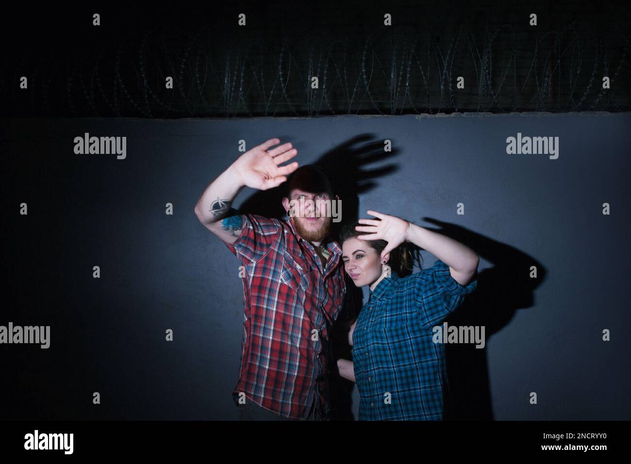 Caught criminals. Dark crime scene Stock Photo - Alamy