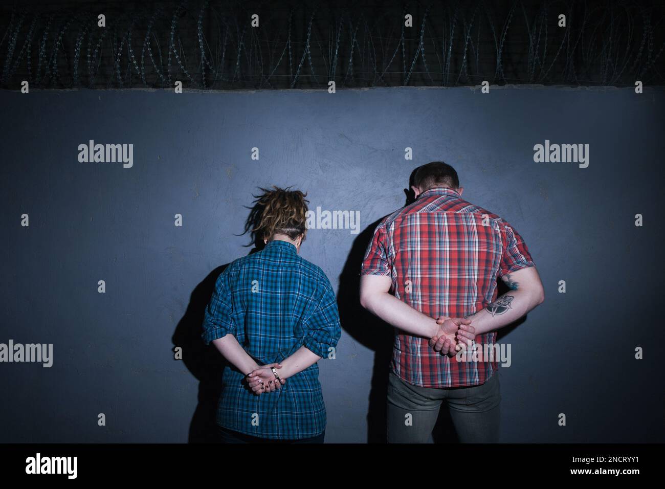Criminal couple. Partners in crime Stock Photo - Alamy