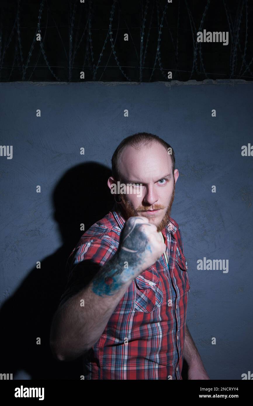 Aggressive criminal male. Attacking man closeup Stock Photo - Alamy