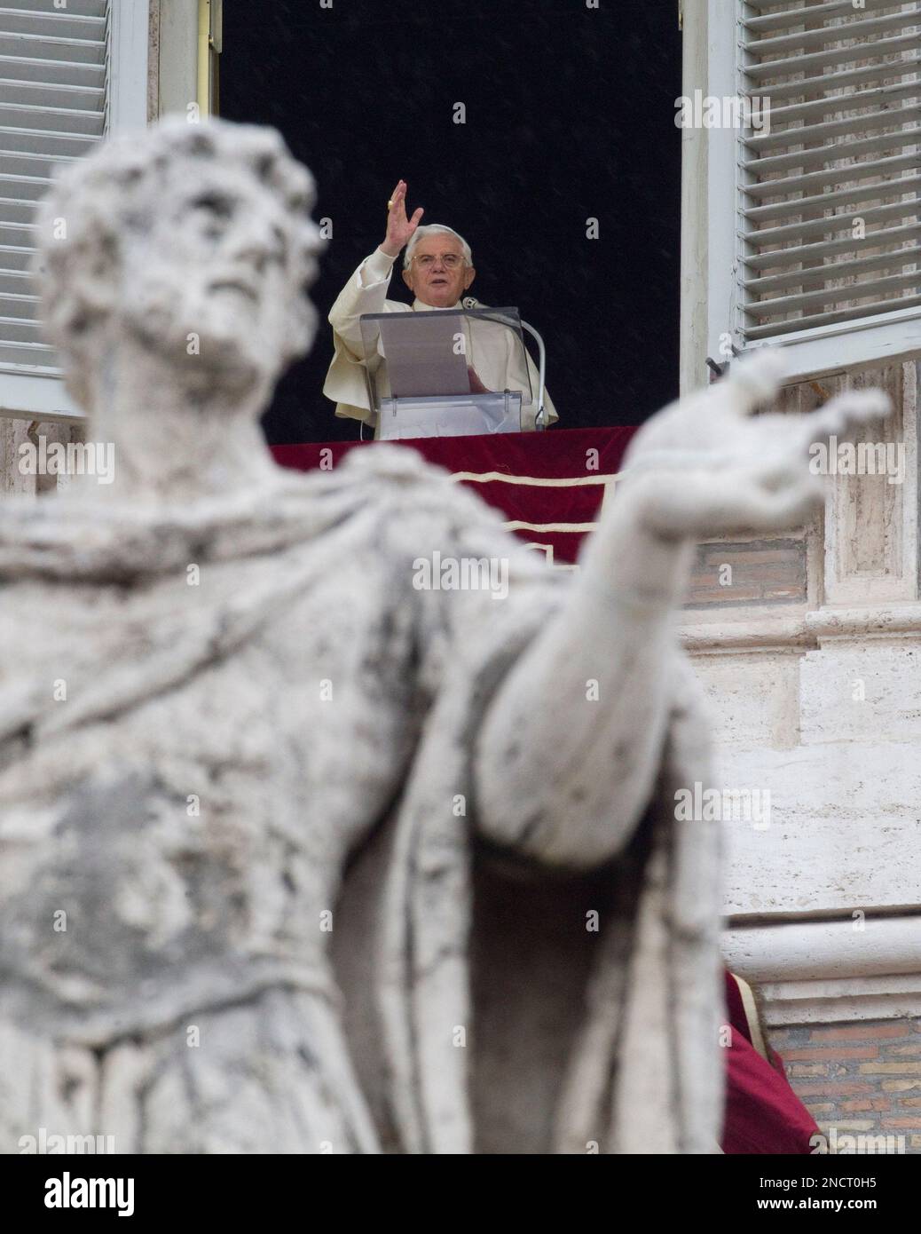 Pope Benedict XVI delivers his blessing during the Angelus noon prayer ...