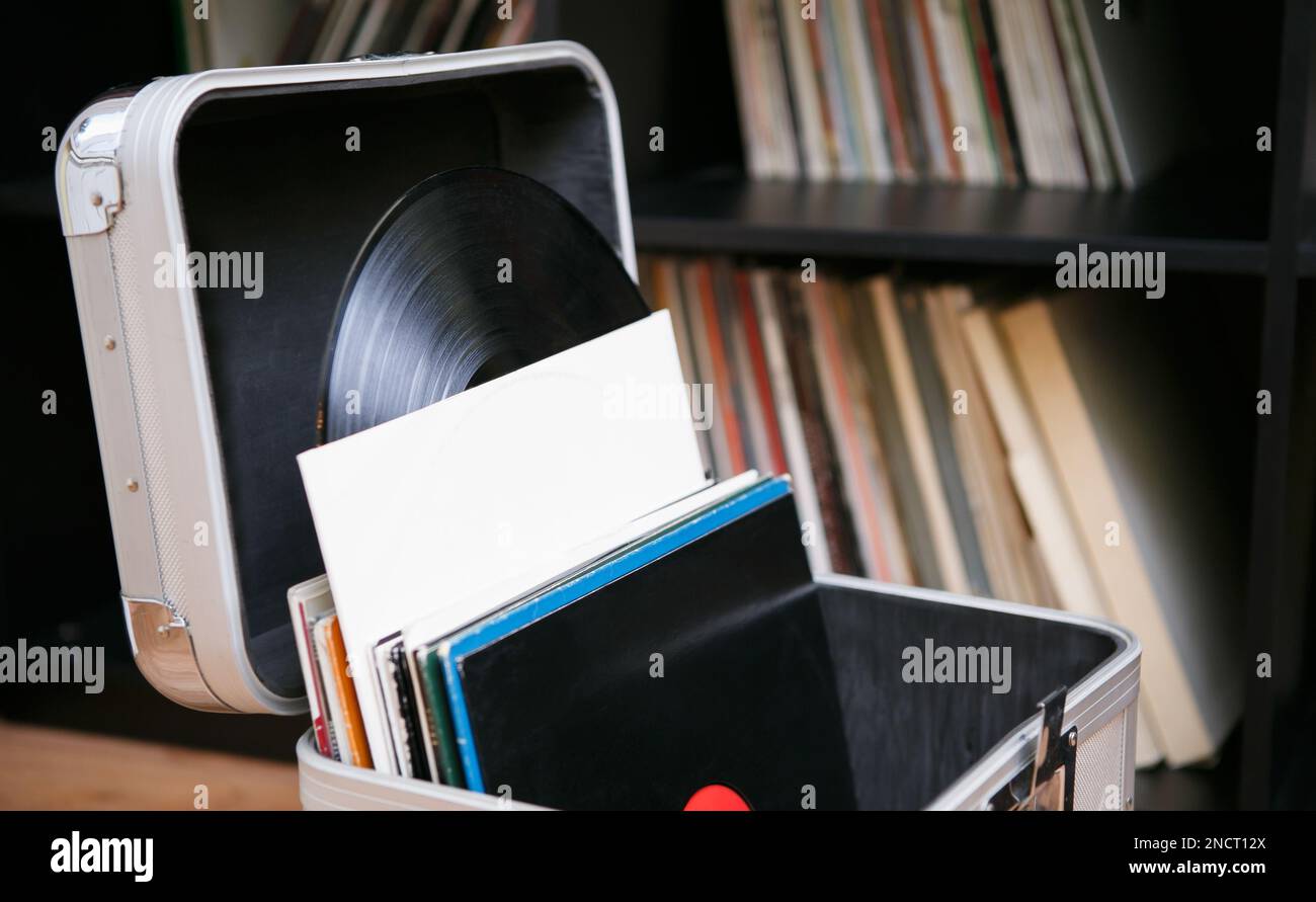 Vinyl record collection for turntable. DJ travel case with set of ...