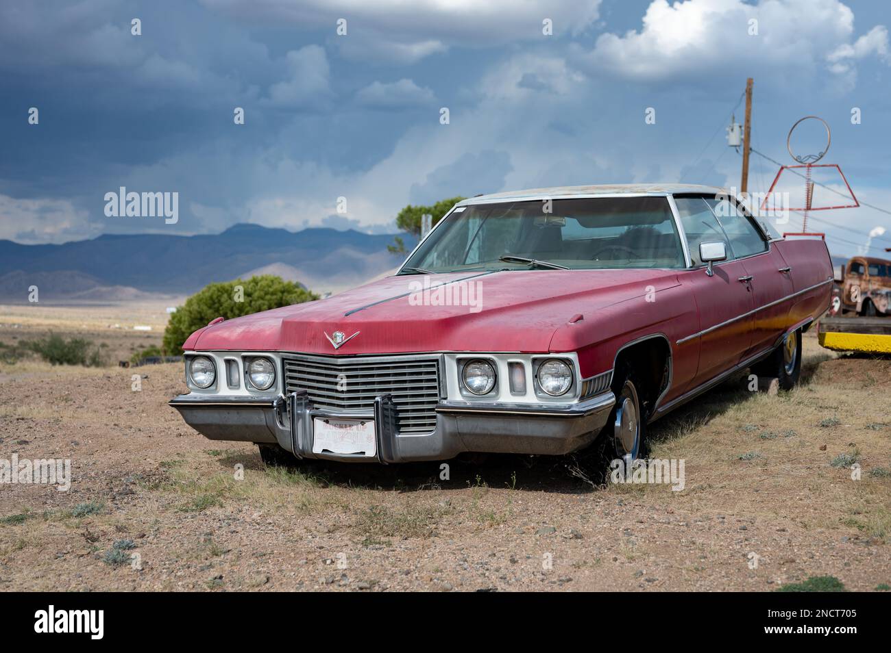 An old Cadillac De Ville Sedan of the fourth generation, it is rose red ...