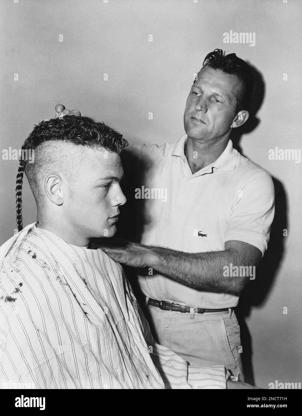 Actor James MacArthur, 19, sits in a barber’s chair on August 27, 1957 ...
