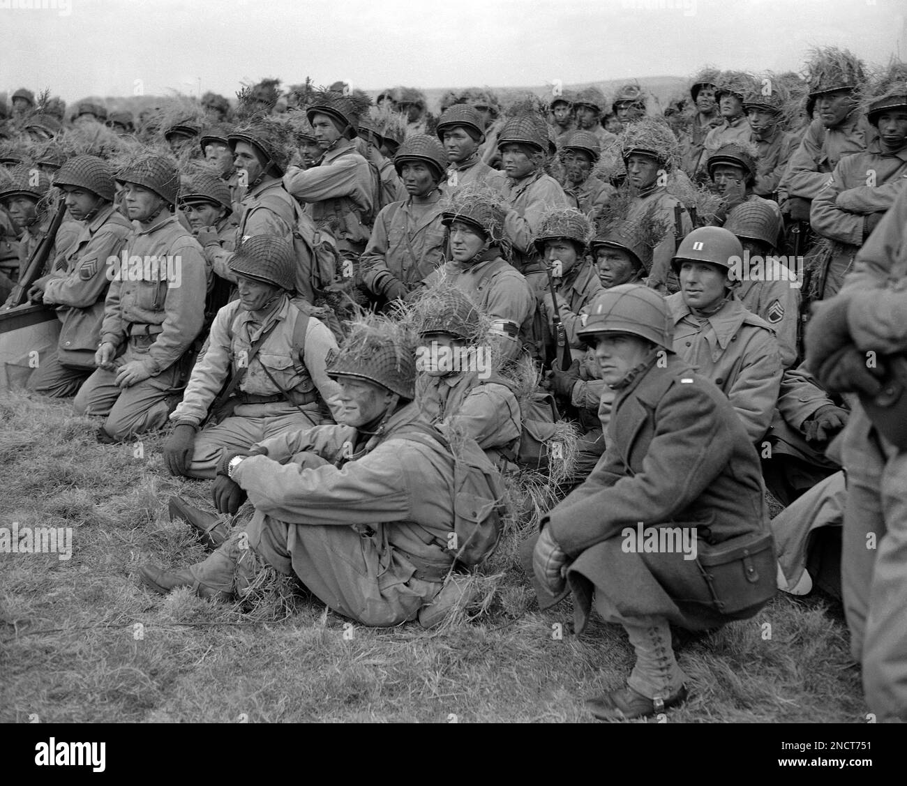 Men of the U.S. Army listen to an address by Lieutenant General George ...