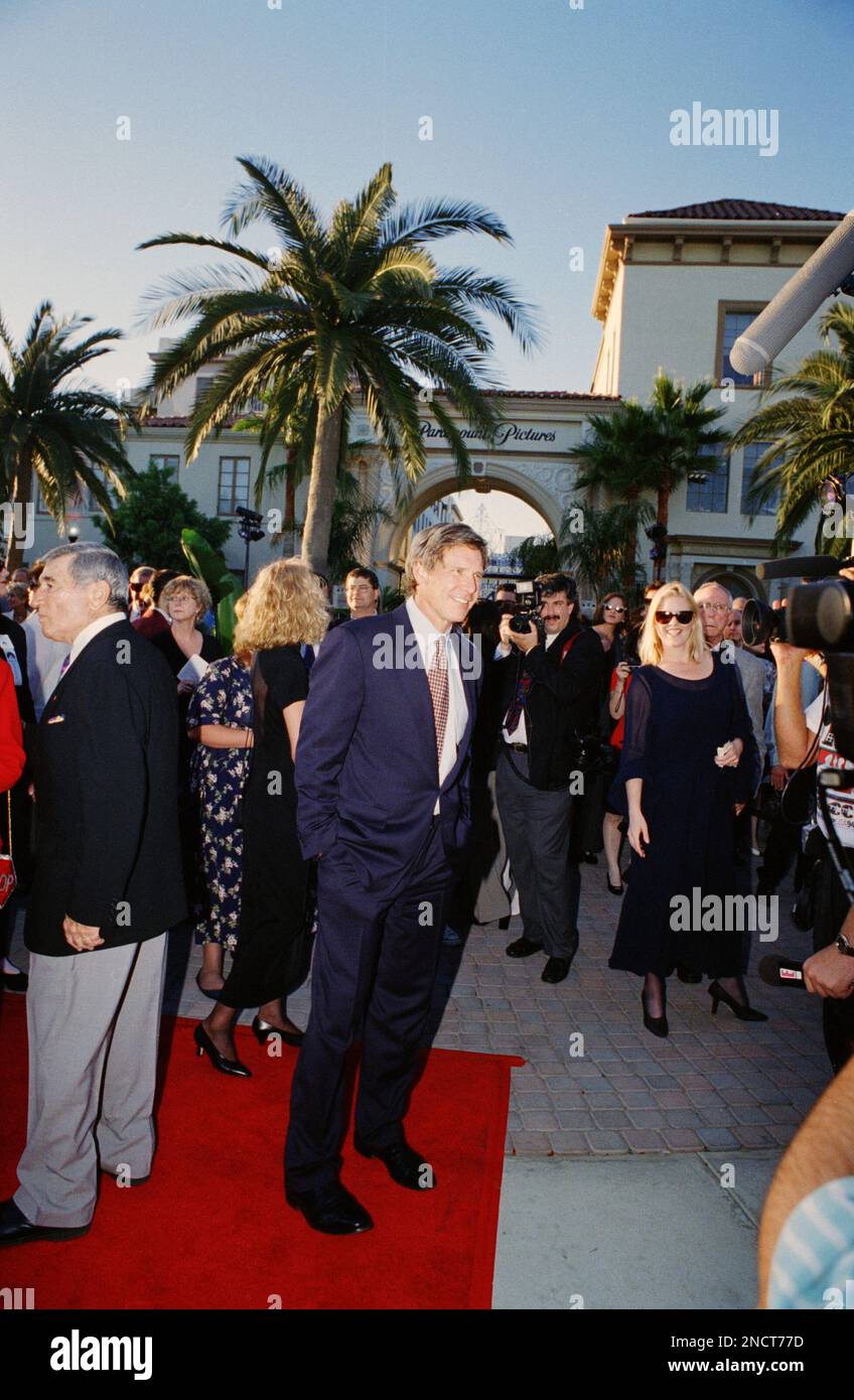 Actor Harrison Ford smiles for the news media in front of Paramount ...