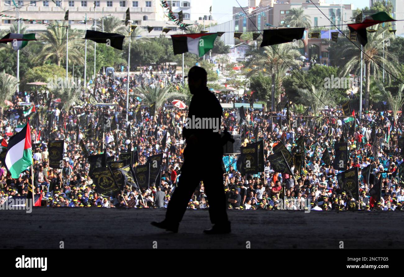 A Palestinian militant of the Islamic Jihad guard during a rally in ...