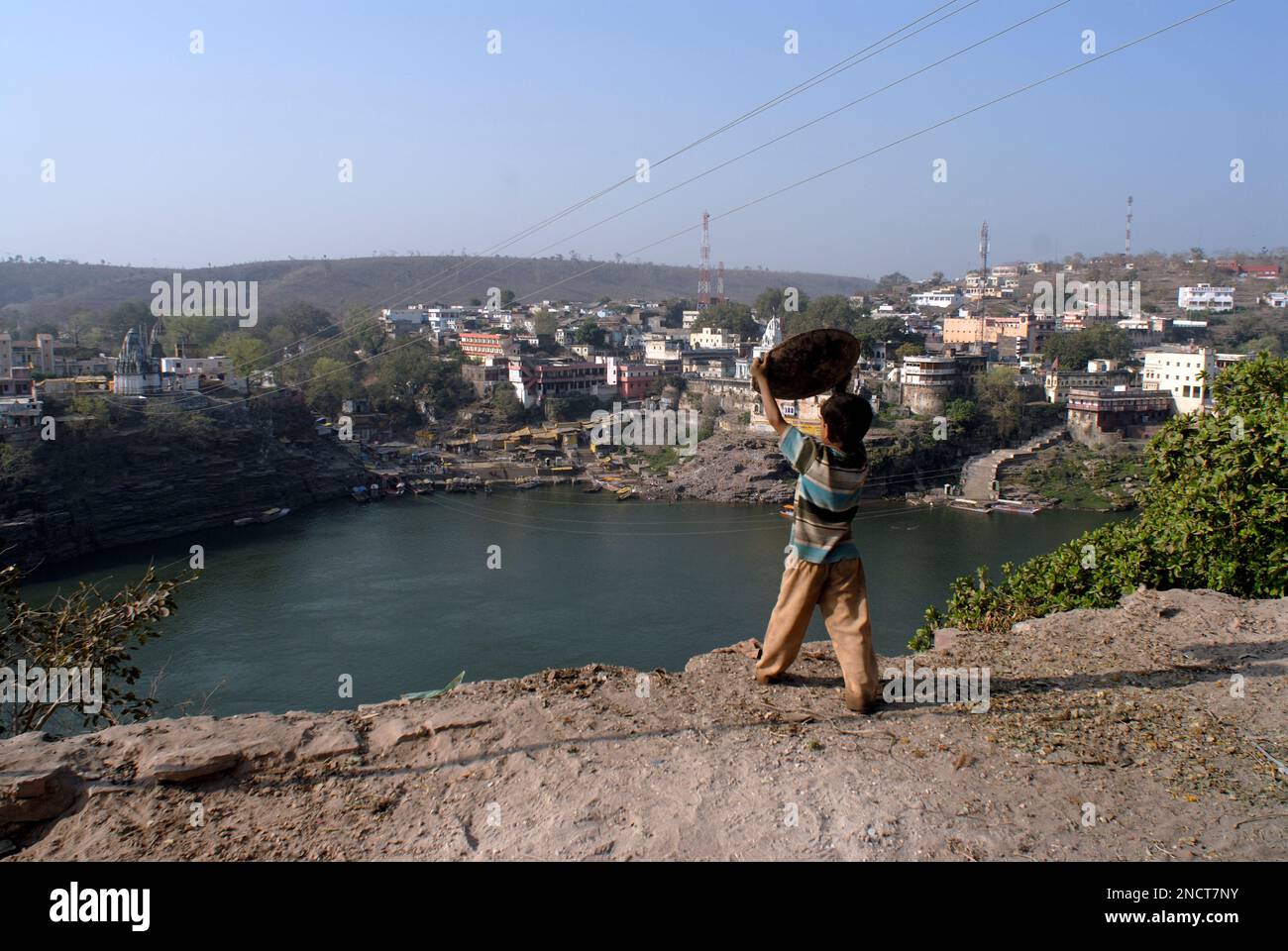 Child labour boy working near river at Omkareshwar district Khandva ...