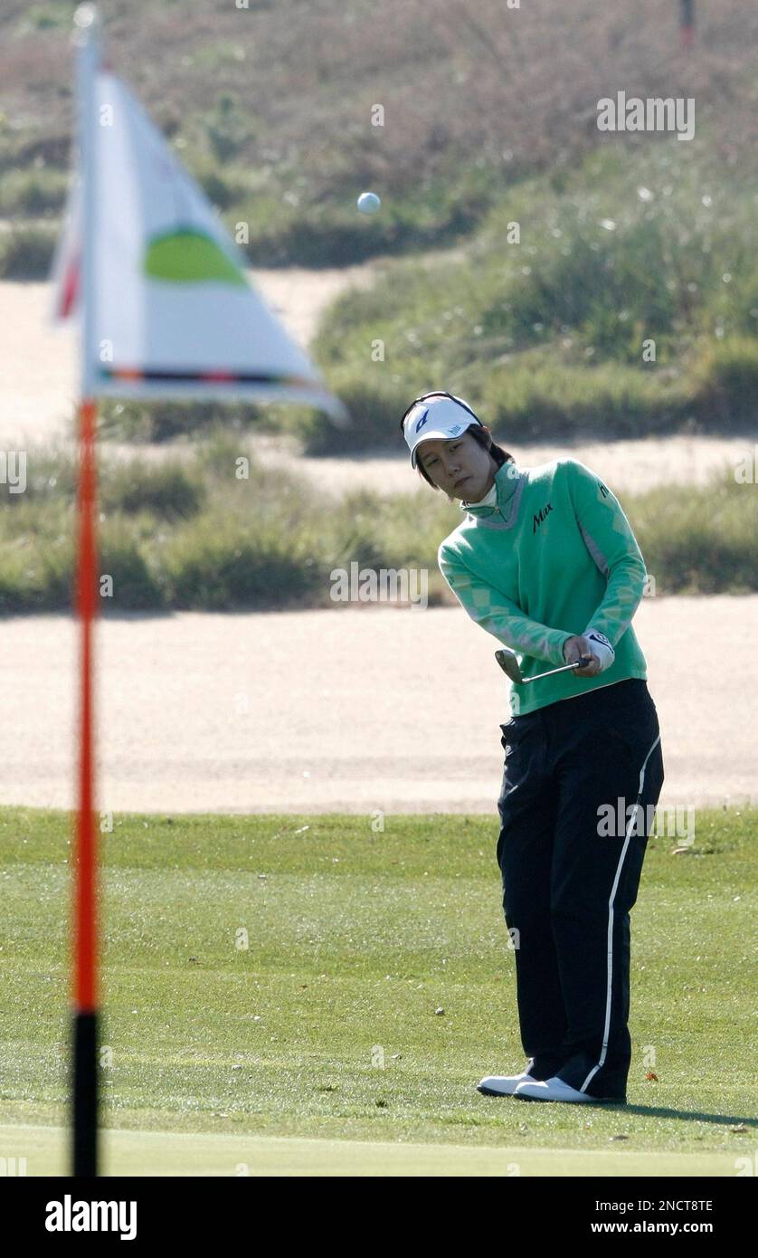 Kim Song-hee of South Korea watches her shot on the first hole during ...