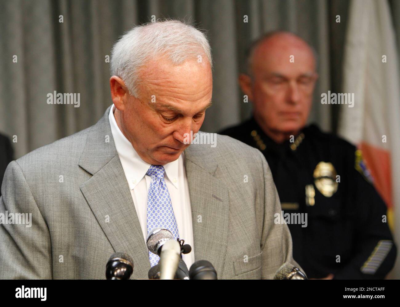 San Diego Mayer Jerry Sanders stops to gather his emotions during a ...