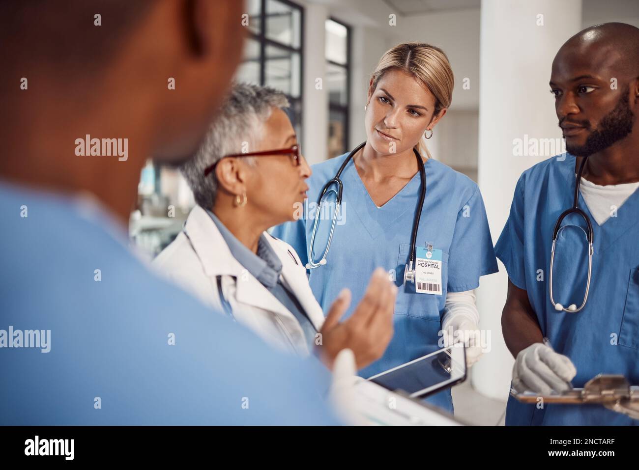 Group of doctors, planning management in hospital and workflow of ...