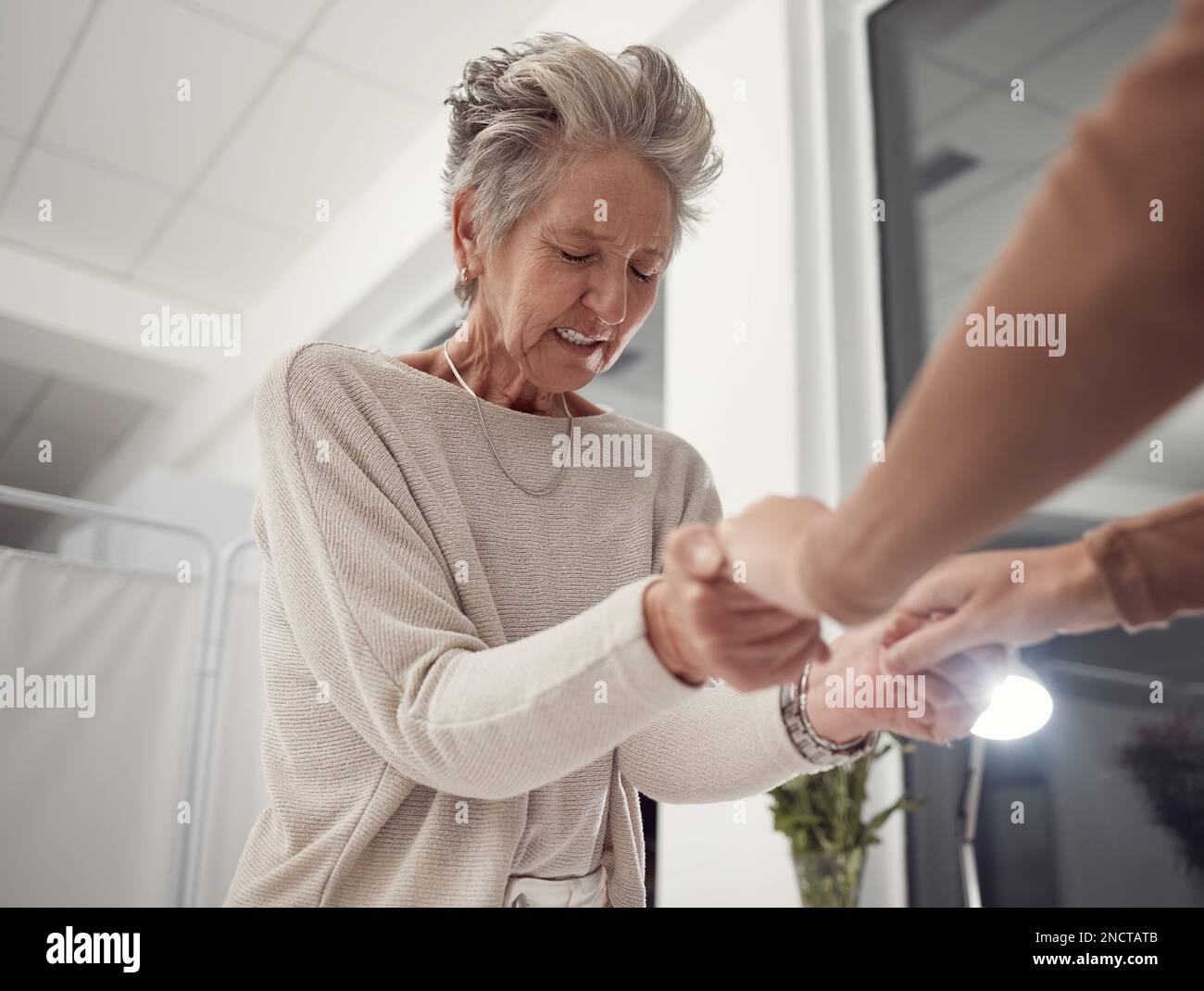 Support, holding hands and prayer of woman at hospital for hope ...