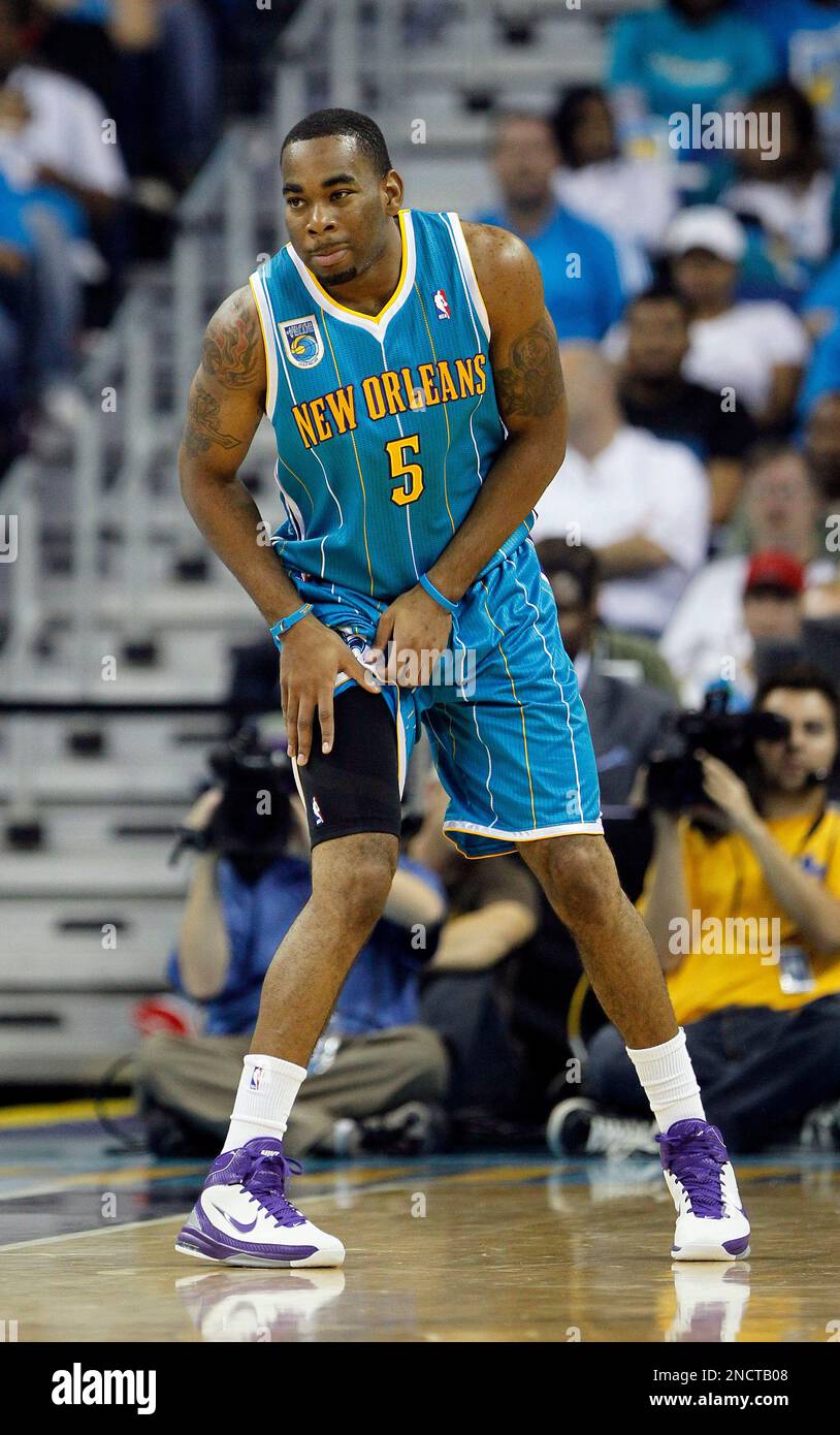 New Orleans Hornets guard Marcus Thornton rubs his right leg as he ...