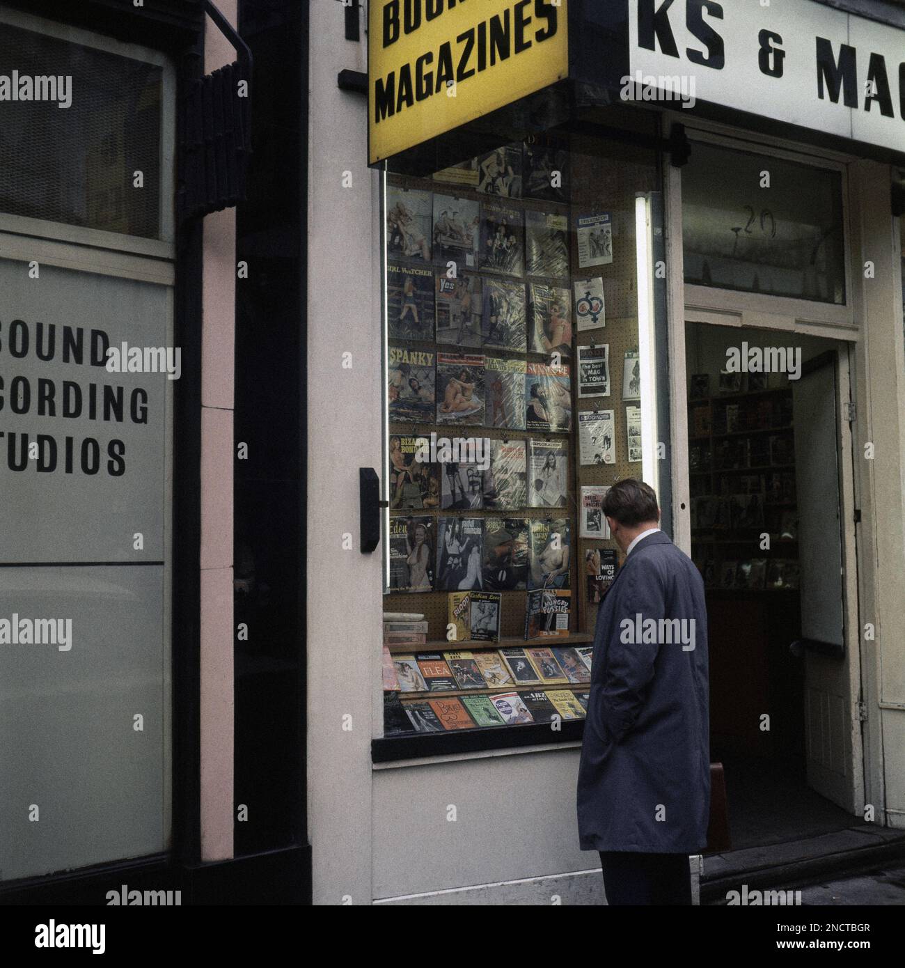 A man looks in a shop window in Soho, central London in 1970. (AP Photo ...