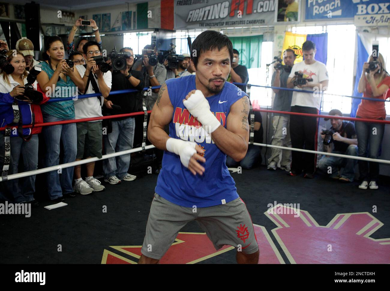 Boxer Manny Pacquiao, of the Philippines, trains for his upcoming ...