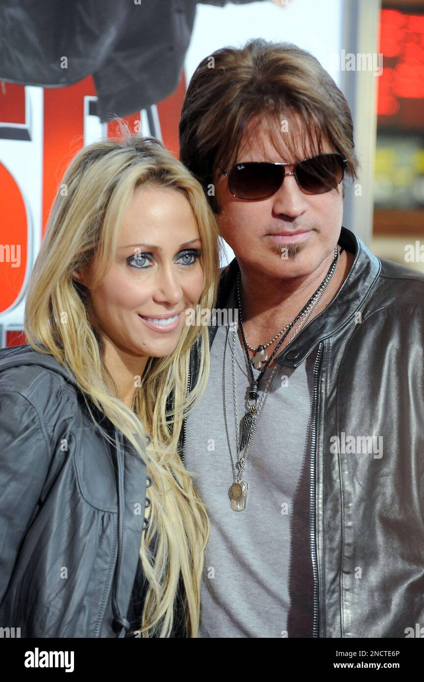 FILE - In this Jan. 9, 2010 file photo, Billy Ray Cyrus, at right, and ...