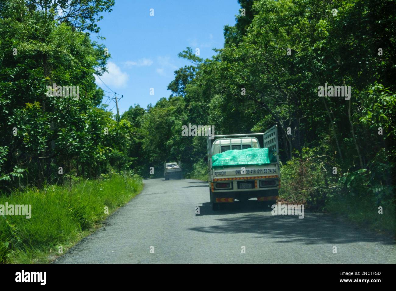 Volunteers in Phnom Penh, Cambodia collect recycling and transport it ...