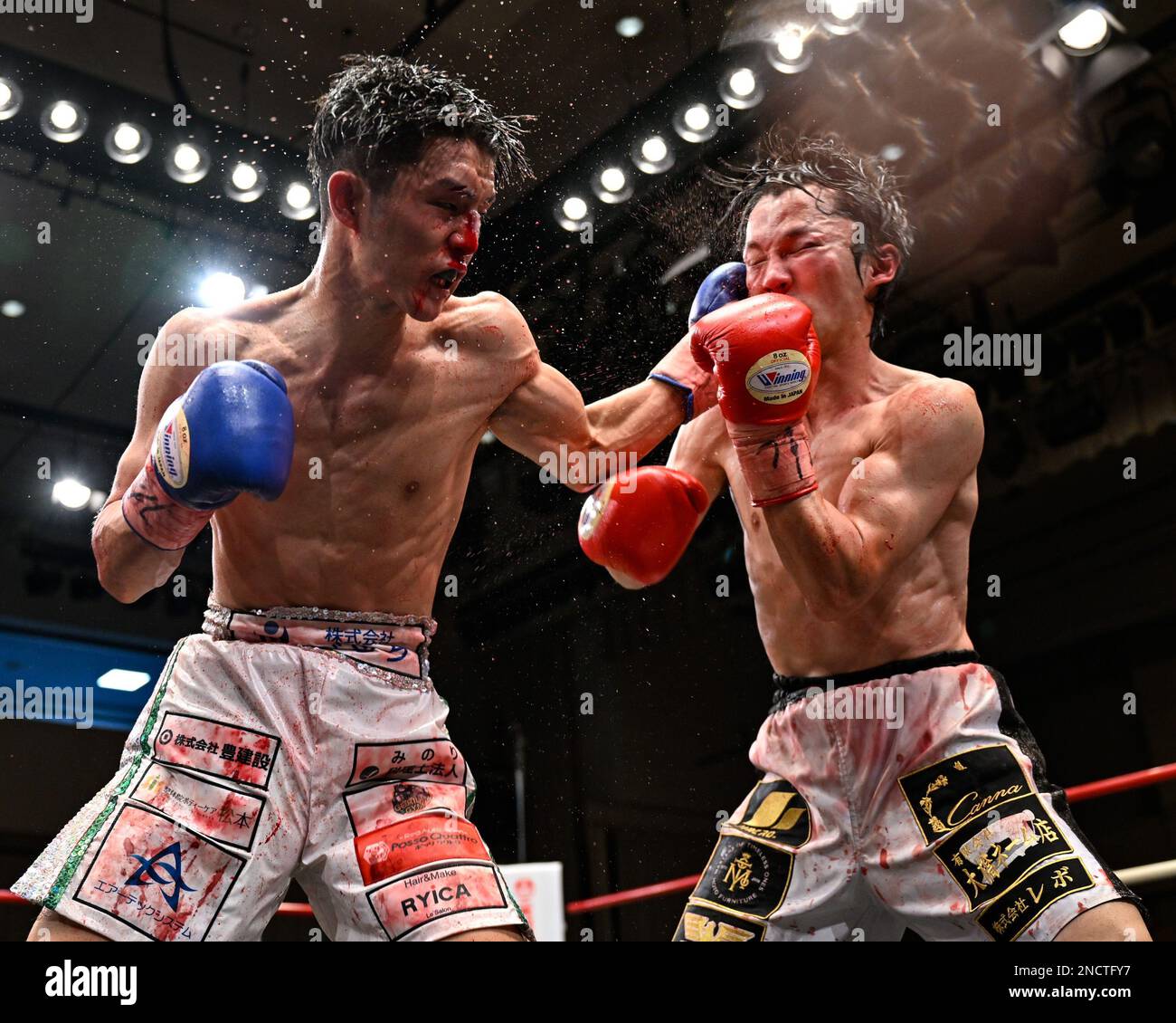 Tokyo, Japan. 14th Feb, 2023. Kenta Nakagawa (red gloves) and Akio ...
