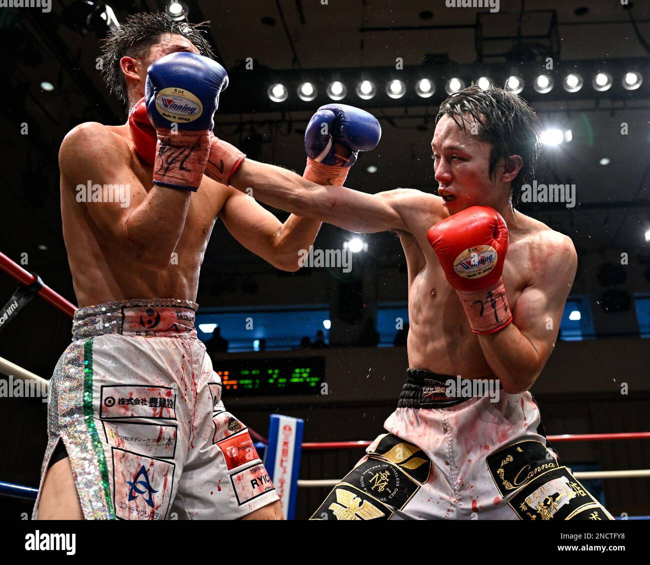 Tokyo, Japan. 14th Feb, 2023. Kenta Nakagawa (red gloves) and Akio Furutani (blue gloves ...