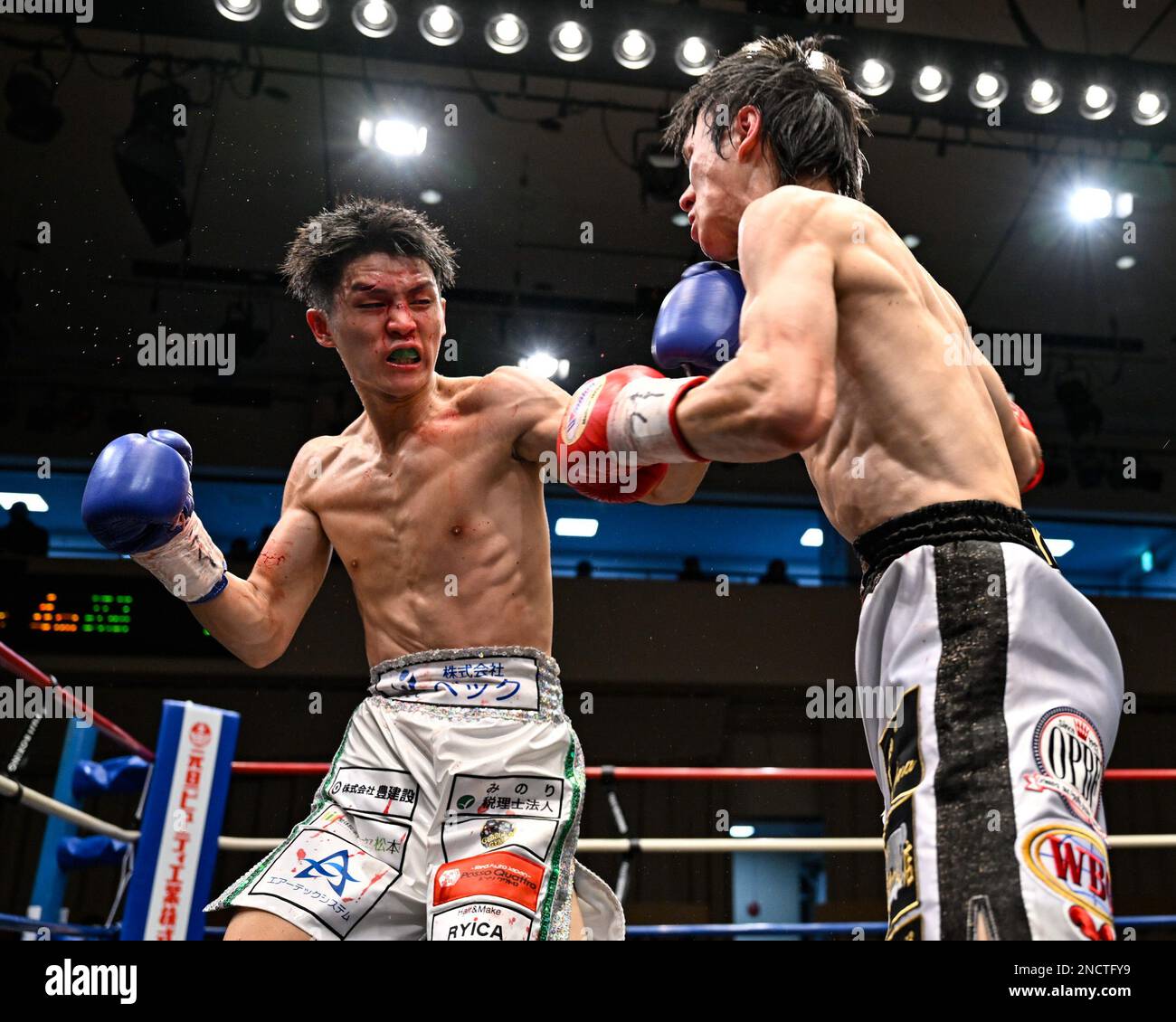 Tokyo, Japan. 14th Feb, 2023. Kenta Nakagawa (red gloves) and Akio Furutani (blue gloves ...