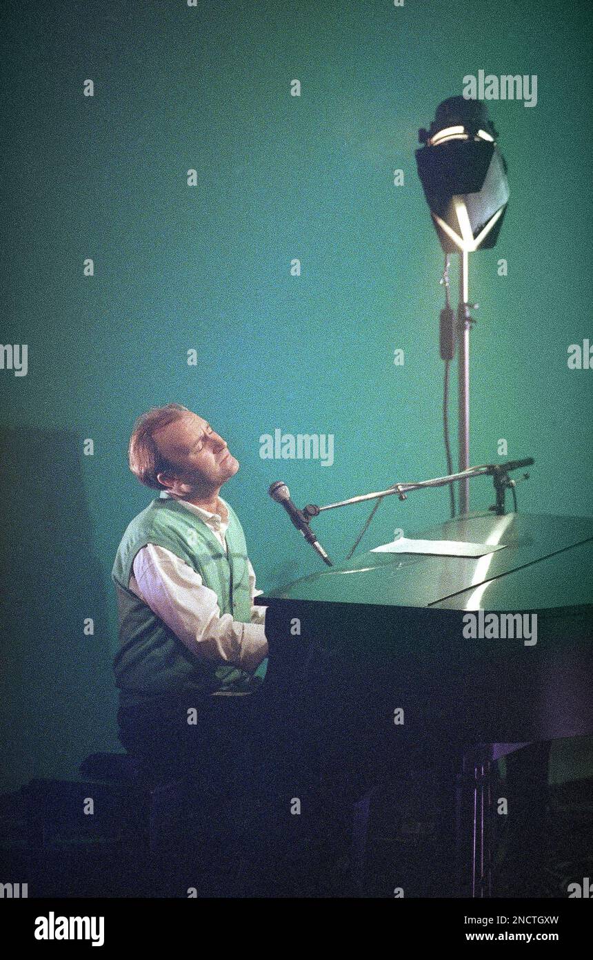 Musician Phil Collins performs selections of his work for the guests at ...