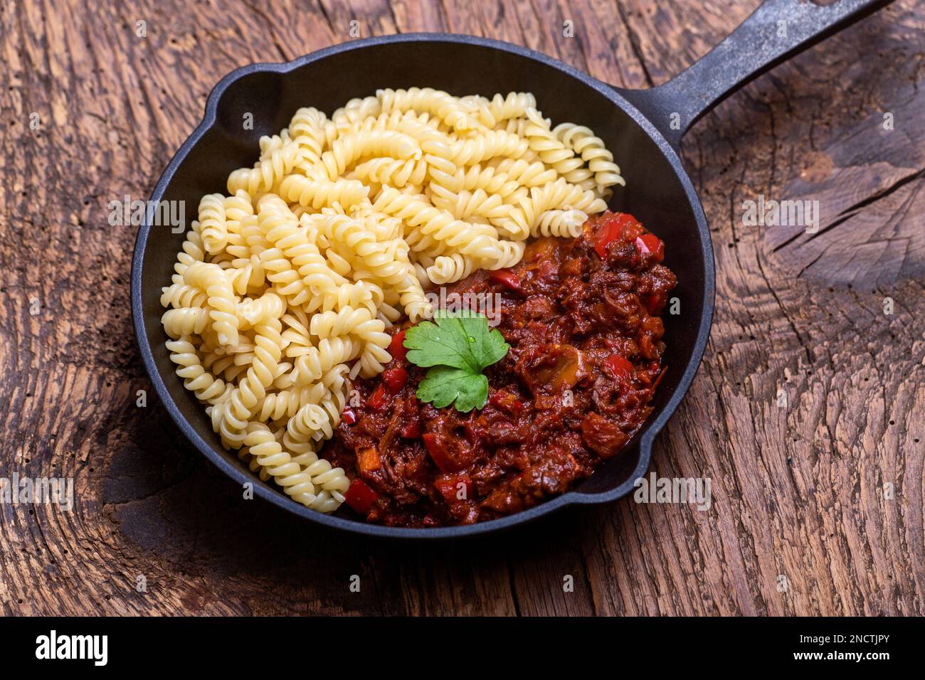 Hungarian Goulash With Spirelli Pasta Stock Photo - Alamy