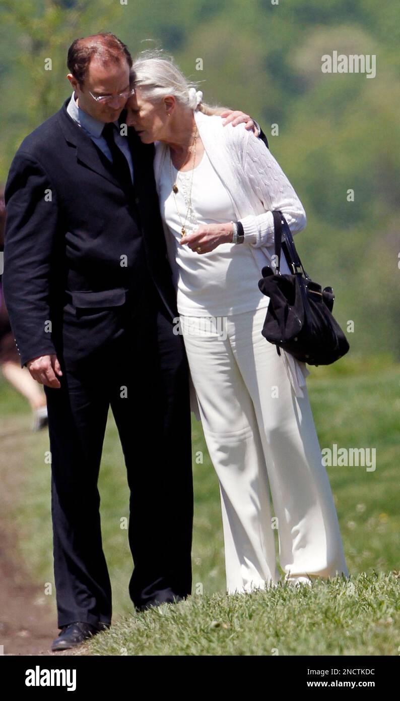 Actress Vanessa Redgrave, right, hugs an unidentified person after a ...