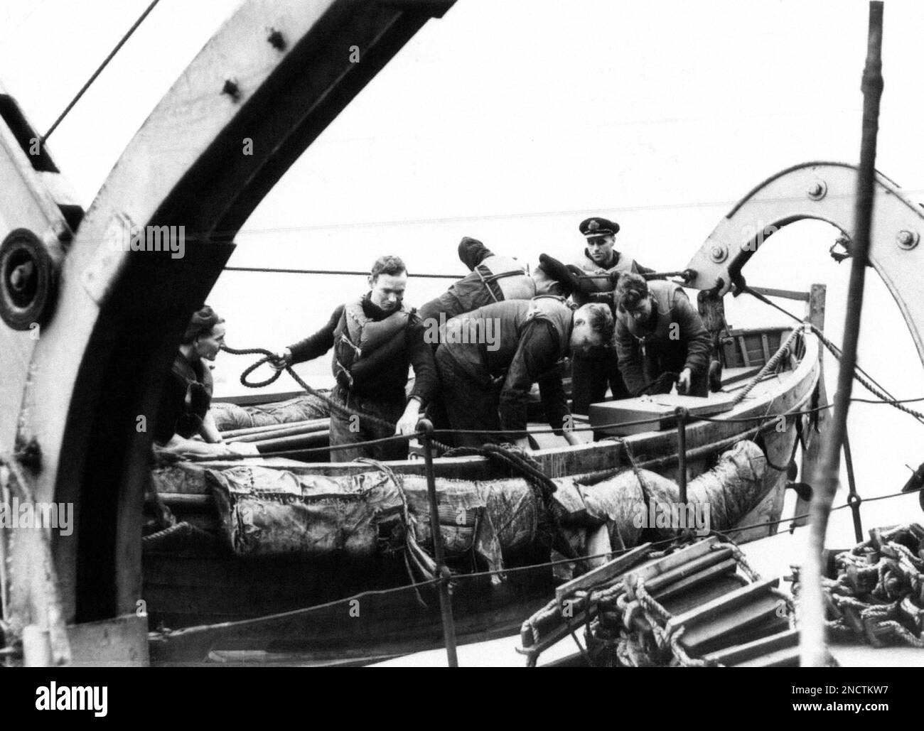 The British rescue ship’s lifeboat crew prepare to go to the rescue of ...