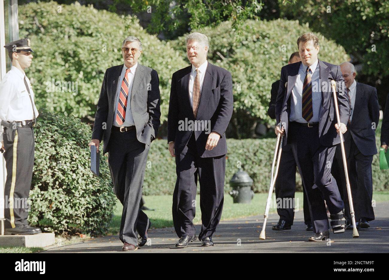 President Bill Clinton Walks With General Motors Vice President William Hoglund At The White