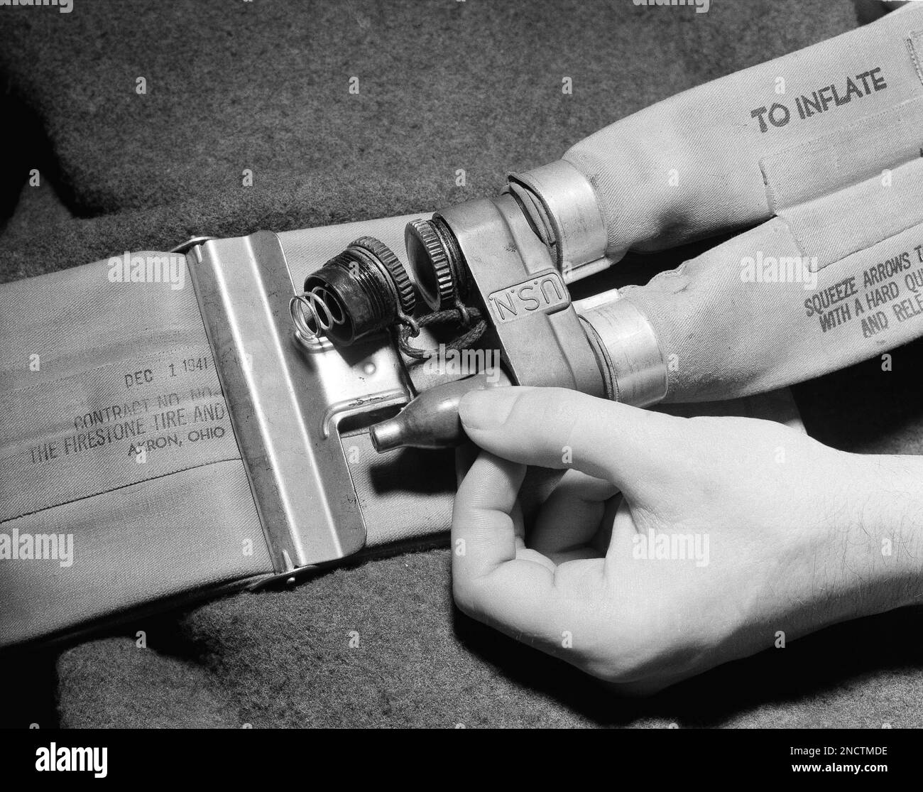 Close up of the new type of air inflated life belt, used by U.S. troops ...