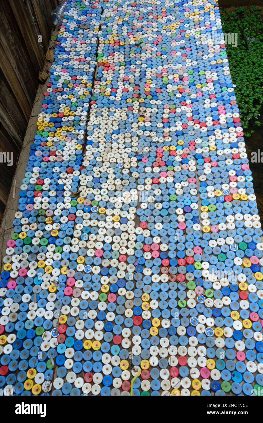 Floor mosiac made from bottle caps at Coconut School which is built ...