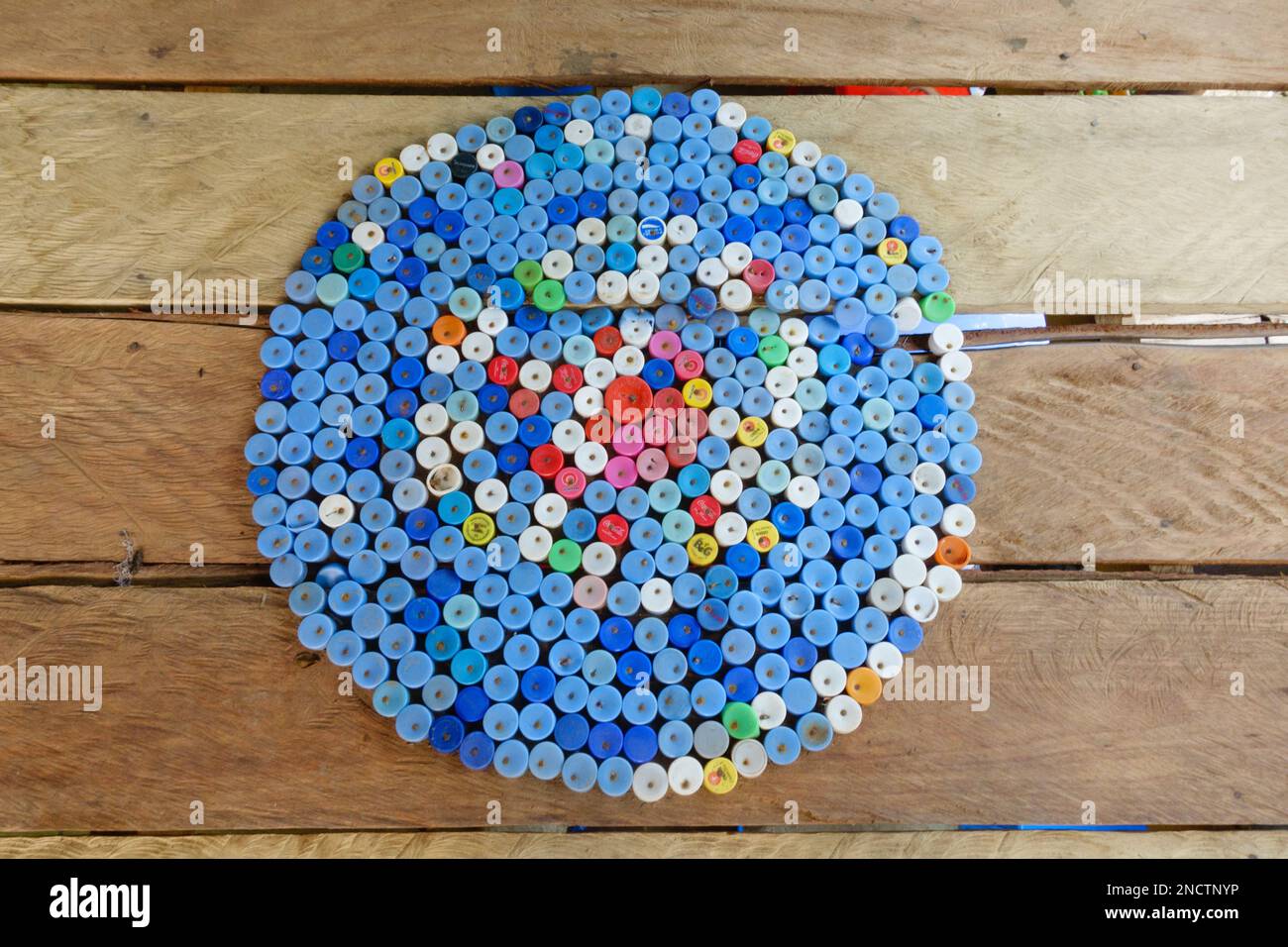 Floor mosiac made from bottle caps at Coconut School which is built ...
