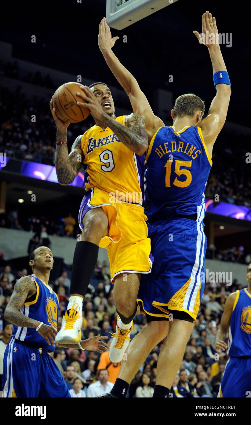 Los Angeles Lakers small forward Matt Barnes, left, goes up for a shot ...