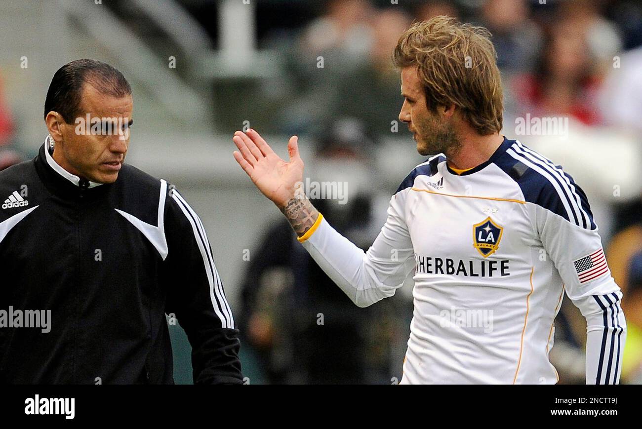 Los Angeles Galaxy midfielder David Beckham, right, shows the center ...