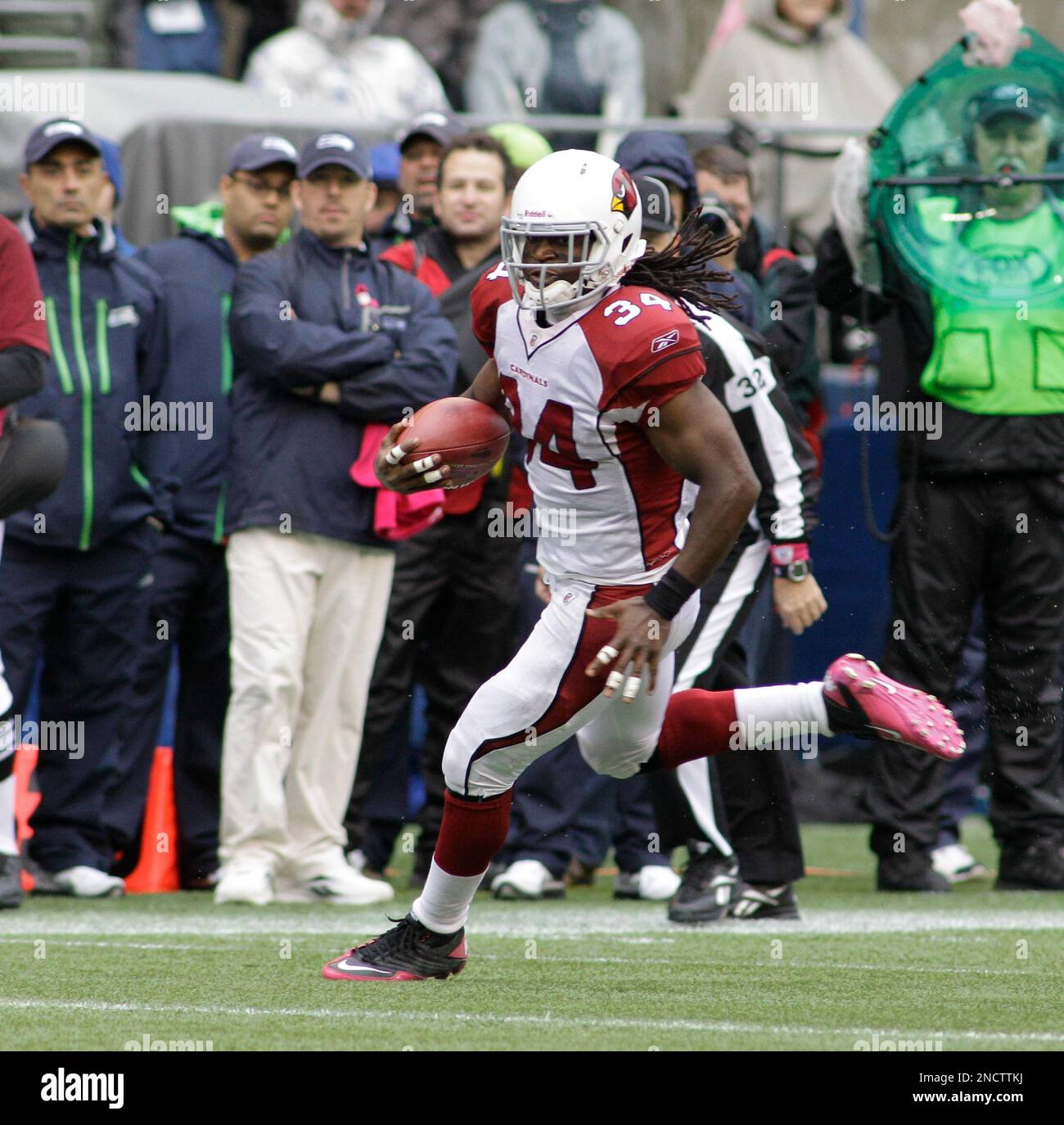 Arizona Cardinals' Tim Hightower (34) runs the ball against the Seattle ...