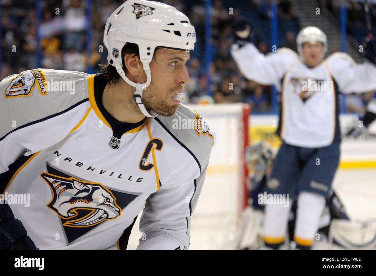 Nashville Predators' Shea Weber, left, of Canada, rounds the rink after ...